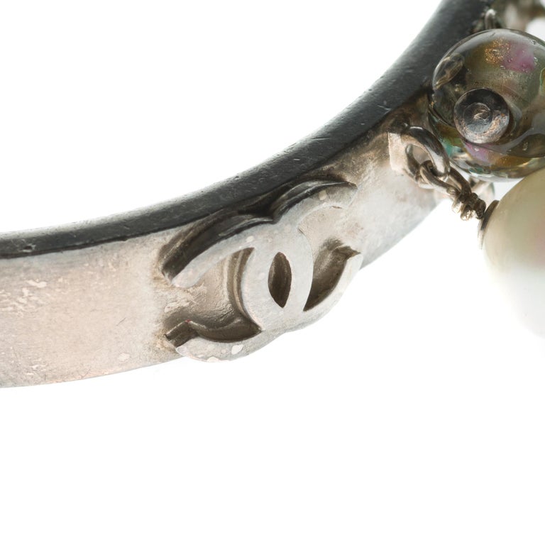 Chanel Bracelet in silver metal with charms For Sale at 1stDibs