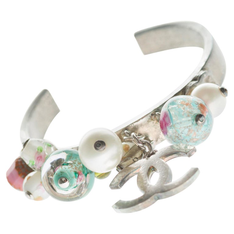 Chanel Bracelet in silver metal with charms For Sale at 1stDibs