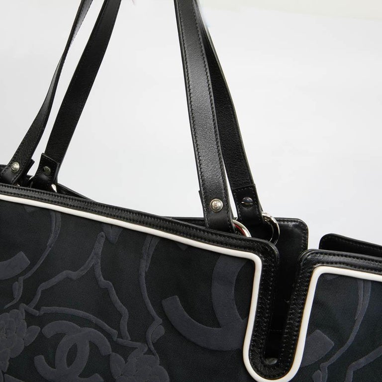 CHANEL Camellia And CC Embossed Canvas Tote Bag at 1stDibs | chanel ...
