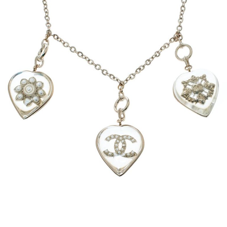 Chanel CC Aged Gold Tone Metal Motif Embedded Resin Heart Pendants ...