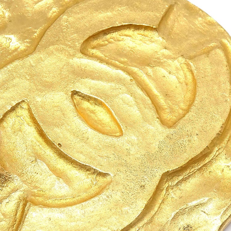 CHANEL CC Gold Metal Round Textured Charm Pin Brooch For Sale at 1stDibs