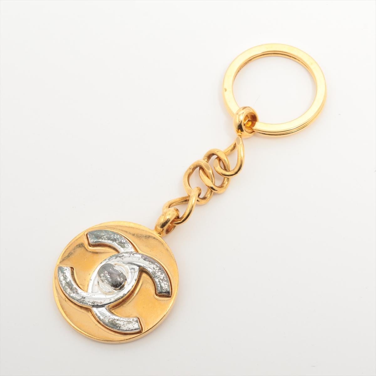 Chanel CC Logo Twistlock Two-toned Bag Charm For Sale at 1stDibs