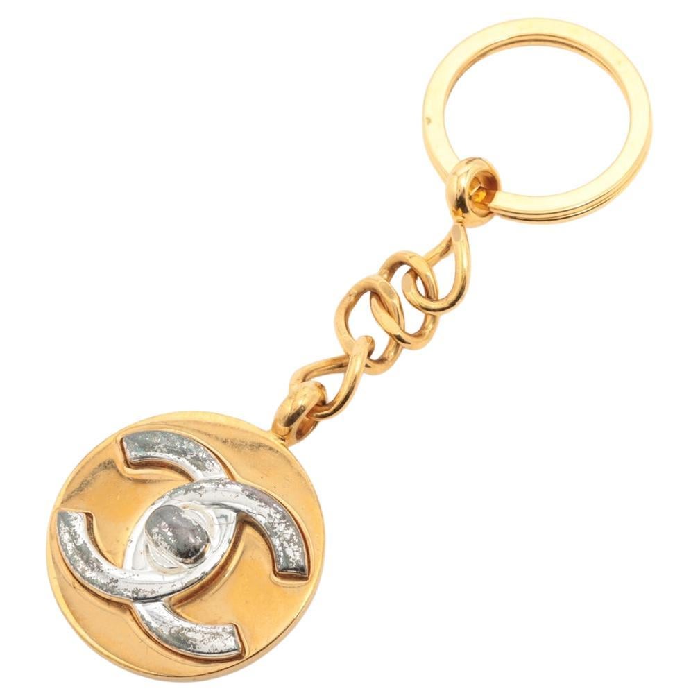 Chanel CC Logo Twistlock Two-toned Bag Charm For Sale at 1stDibs