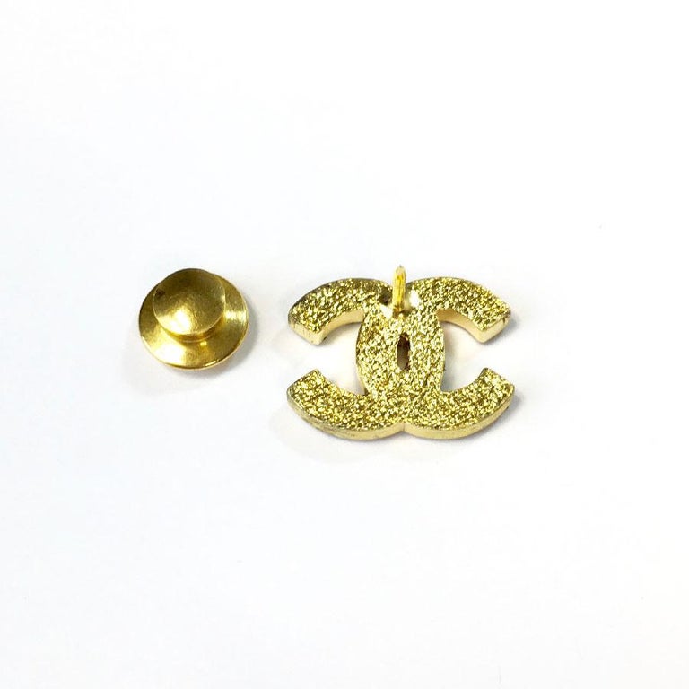 CHANEL CC Pin in Gilt Metal set with Rhinestones at 1stDibs