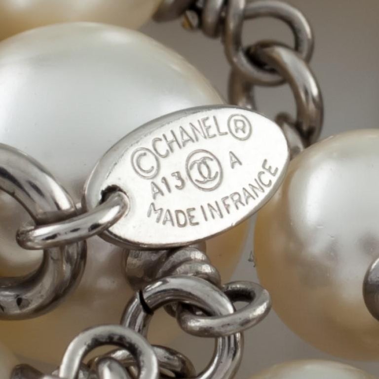Chanel Classic Long Pearl Necklace with 5 CC Silver Crystal Logos at ...