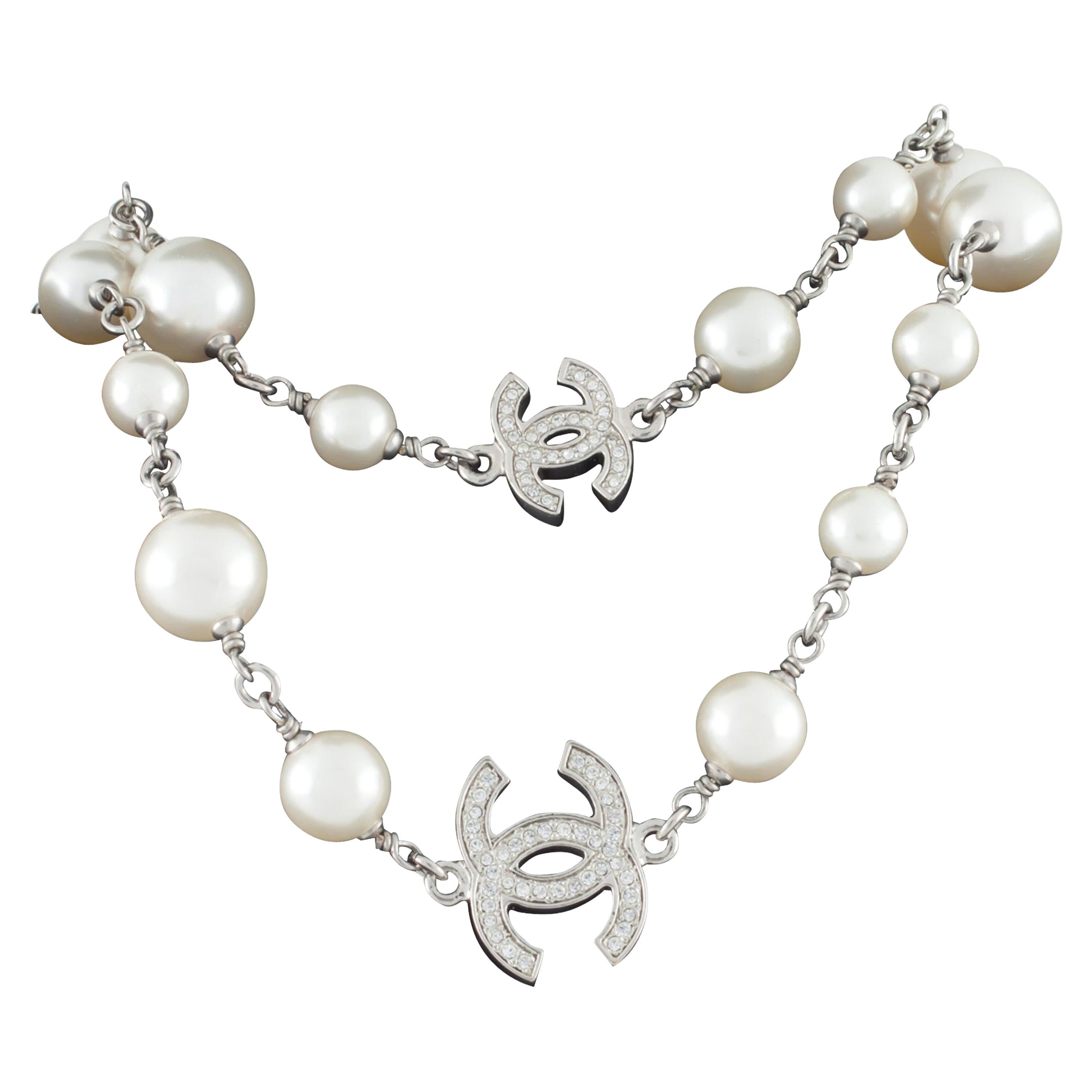 Chanel Classic Long Pearl Necklace with 5 CC Silver Crystal Logos at ...