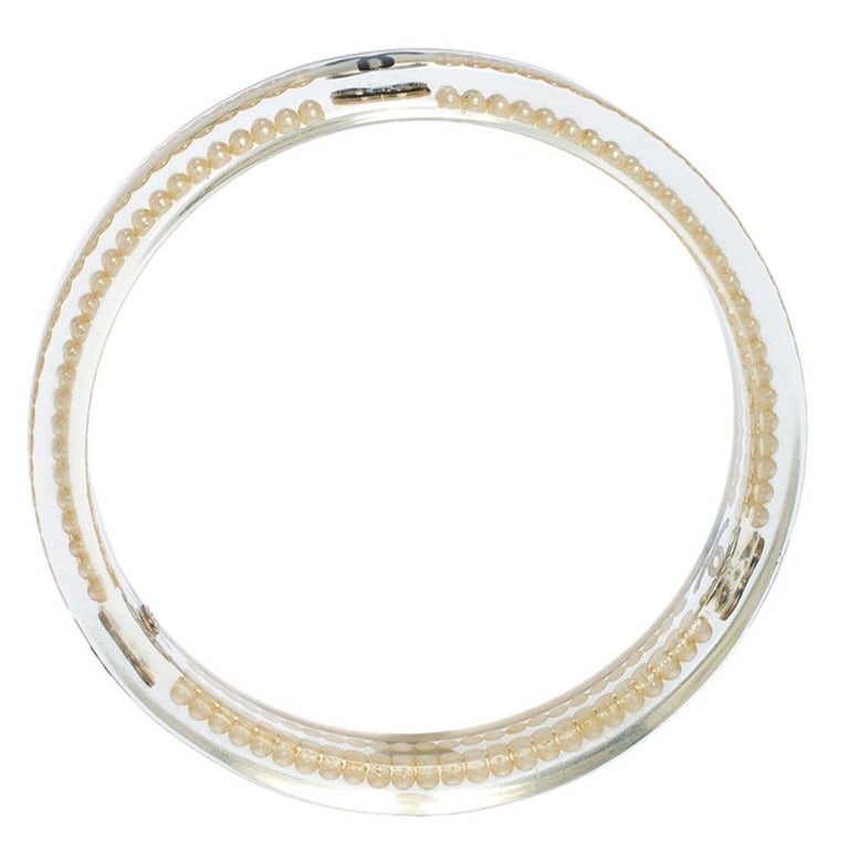 Chanel Clear Resin CC Logo and Pearl Lucite Bangle For Sale at 1stDibs