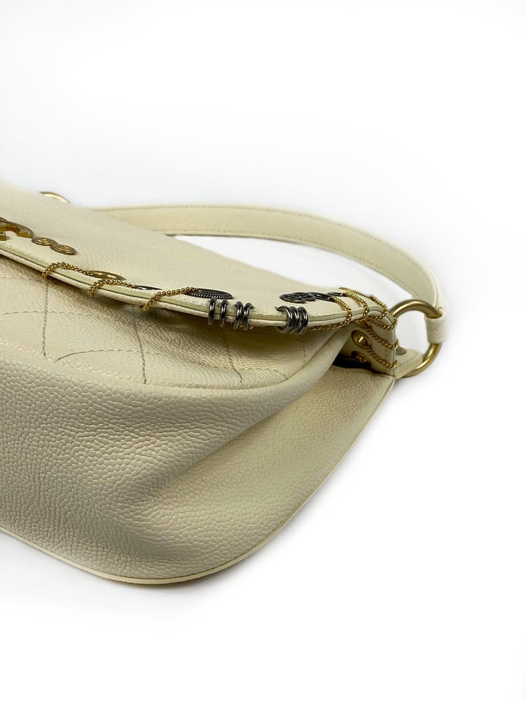 CHANEL Cream/ Ivory Caviar Quilted Grommet Embellished Piercing Flap ...