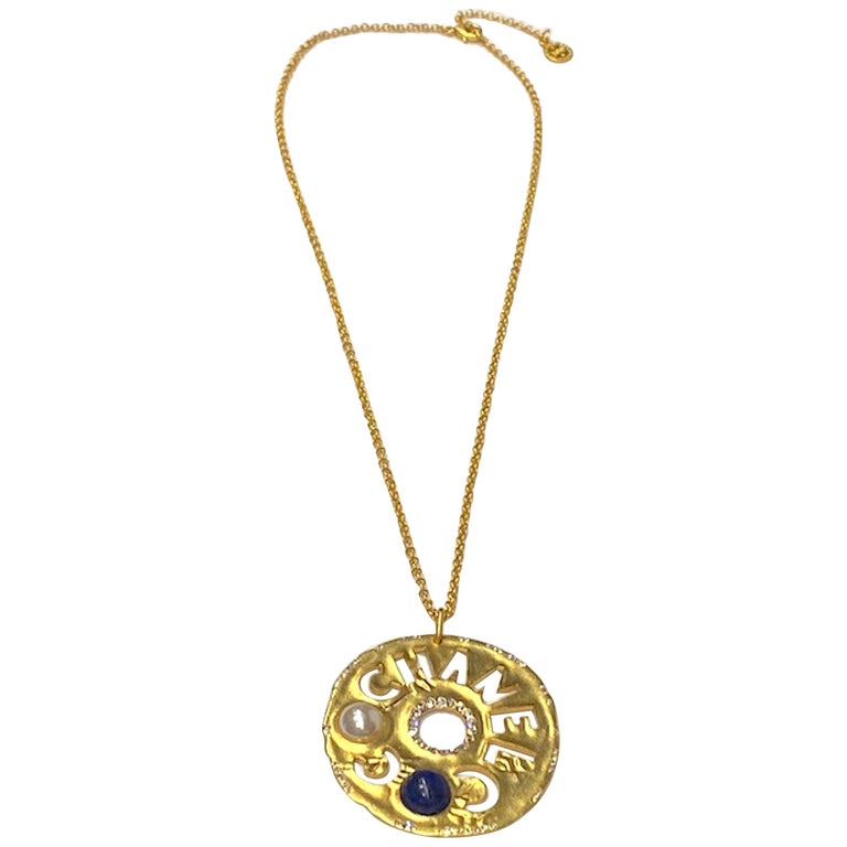 Chanel Cut Out Disk Pendant Necklace, 2019 Cruise Collection at 1stDibs