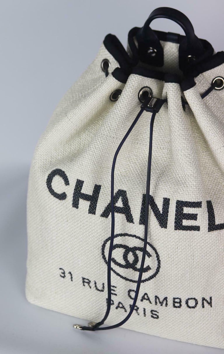 Chanel Deauville Leather Trimmed Raffia Backpack at 1stDibs