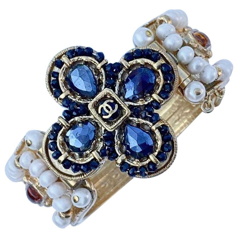 Chanel Gilt Metal With CC Symbol And Pearls Cuff Bracelet For Sale at ...