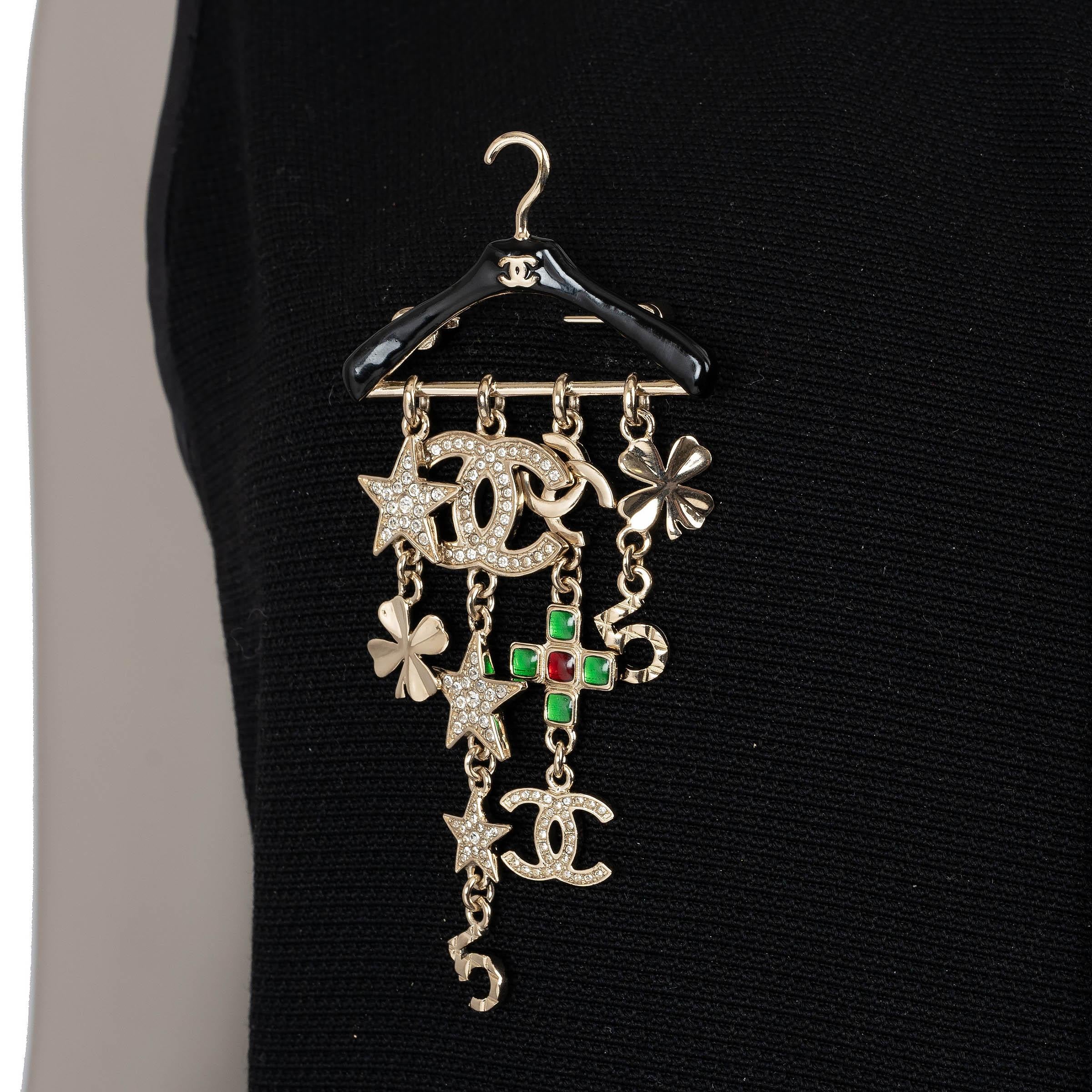 CHANEL gold 23C MONTE CARLO CHARMS HANGER Brooch For Sale at 1stDibs