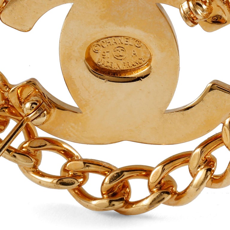 Chanel Gold CC Clasp with Chain Surround Pin For Sale at 1stDibs
