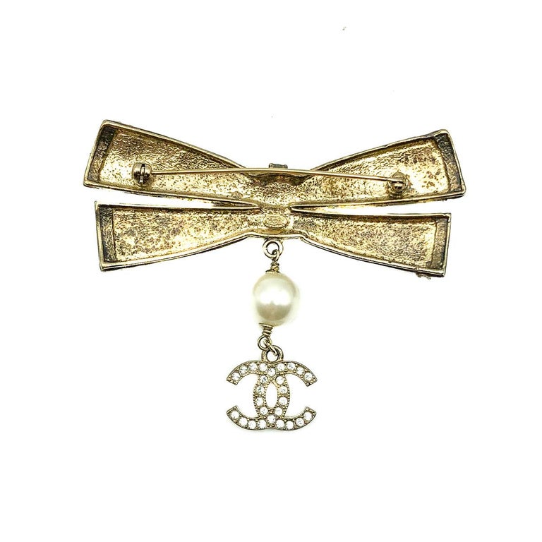 Chanel Gold Crystal and Pearl Bow CC Brooch 2006 For Sale at 1stDibs