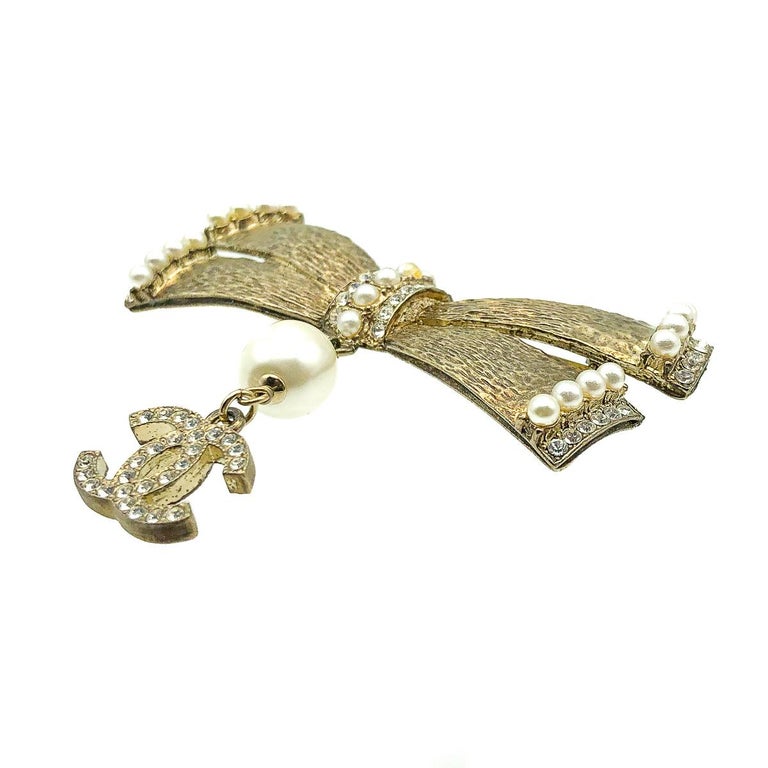 Chanel Gold Crystal and Pearl Bow CC Brooch 2006 For Sale at 1stDibs