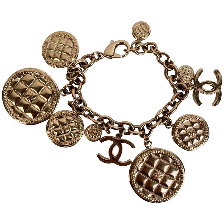 Chanel Gold Metal CC Logo and Quilted Charm Bracelet For Sale at 1stDibs