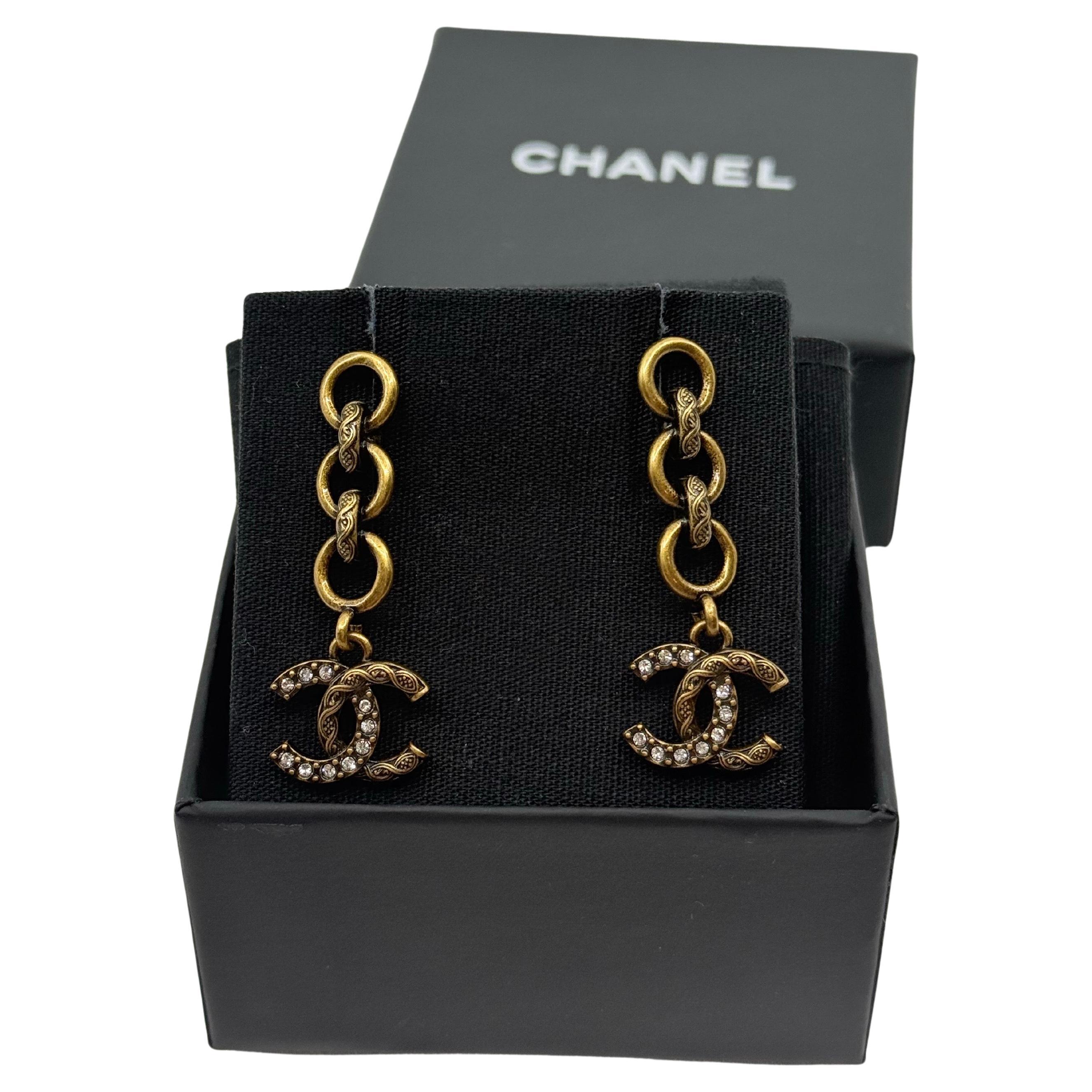 CHANEL Gold Old Age Metal Crystal CC Chain Dangle Earrings For Sale at ...
