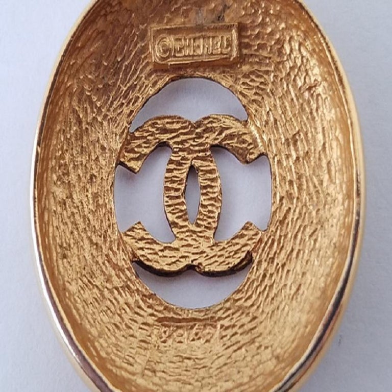 Chanel Gold-tone Metal CC Logo Cutout Sunburst Pendant Necklace For ...