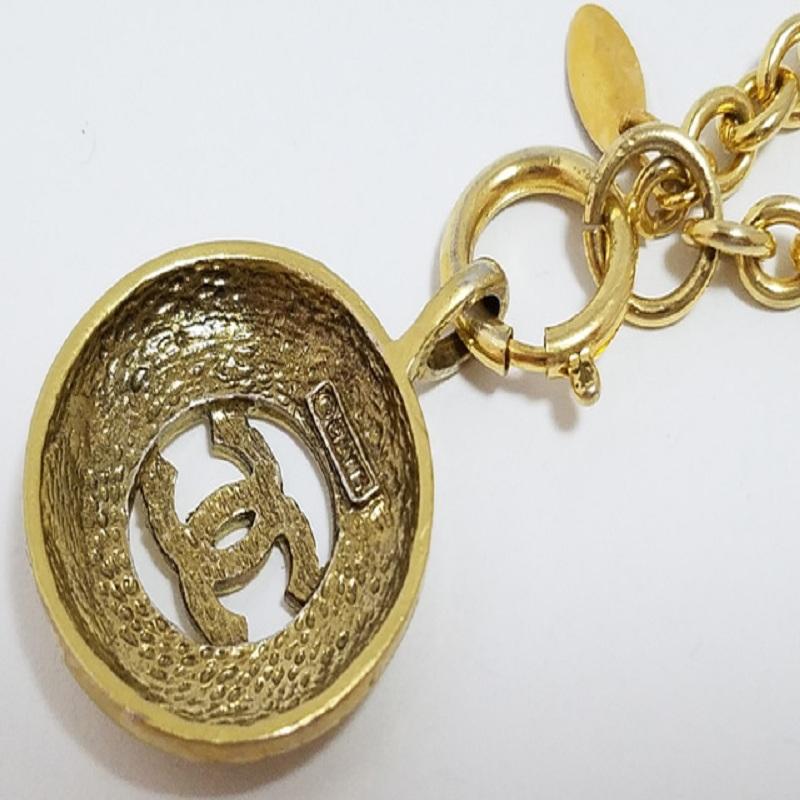 Chanel Gold-tone Metal CC Logo Cutout Sunburst Pendant Necklace at 1stDibs
