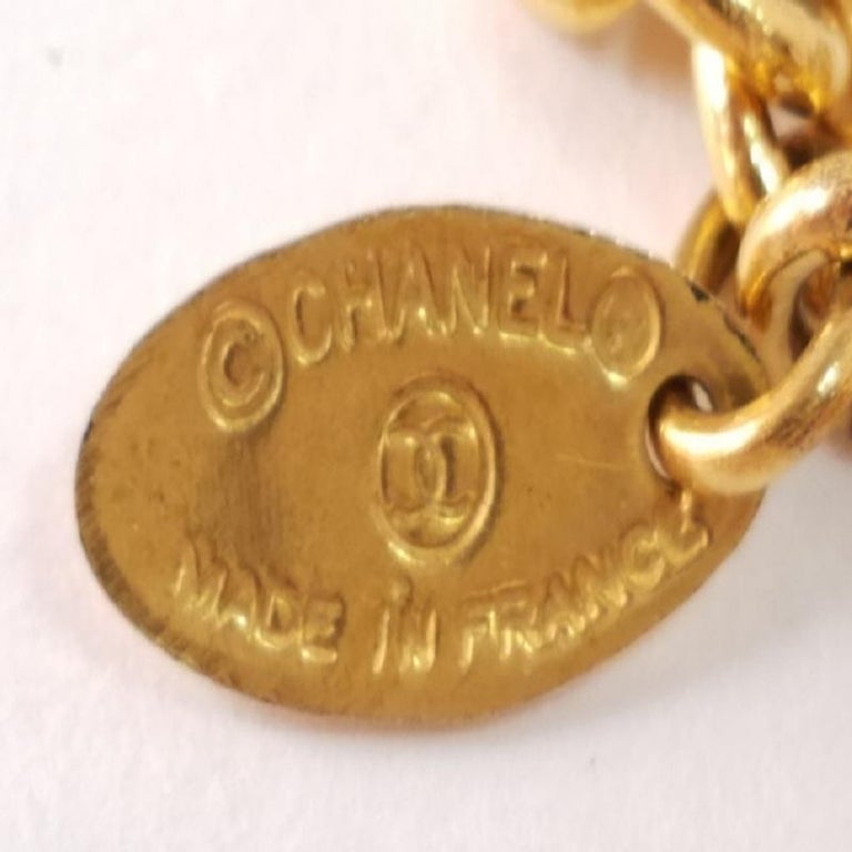 Chanel Gold-Tone Metal CC Logo Sunburst Pendant Necklace at 1stDibs