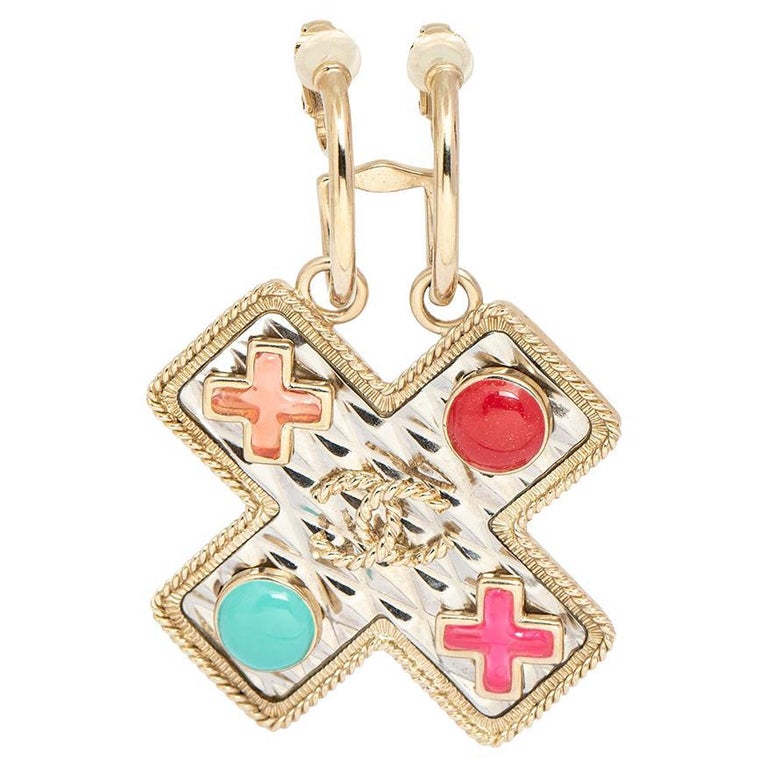 Chanel Gold Tone Resin XO Single Clip On Earring at 1stDibs