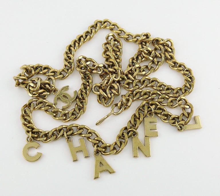 Chanel Gold Toned CC Logo and Letter Charms Chain Belt at 1stDibs