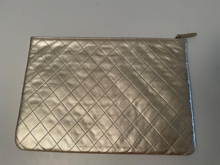 Chanel golden clutch bag For Sale at 1stDibs