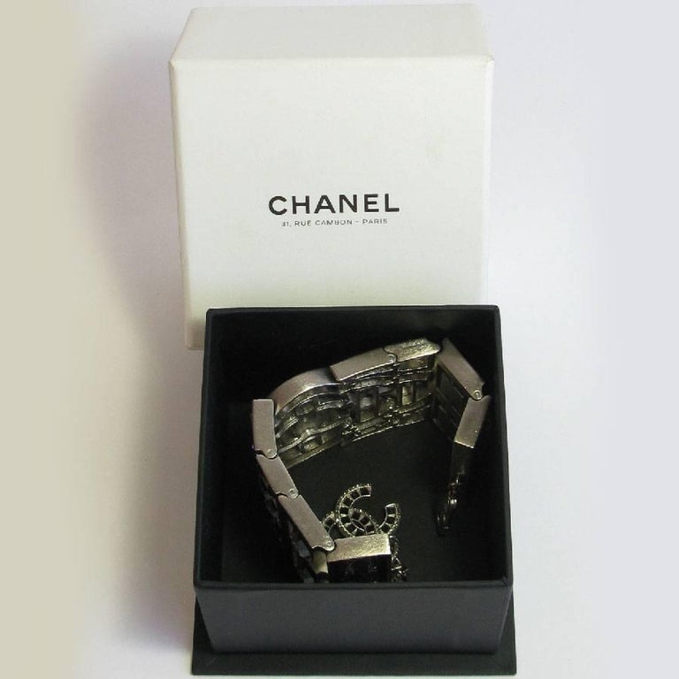 CHANEL Hinged Cuff Bracelet in Matte Silver Metal Set with Swarovski ...