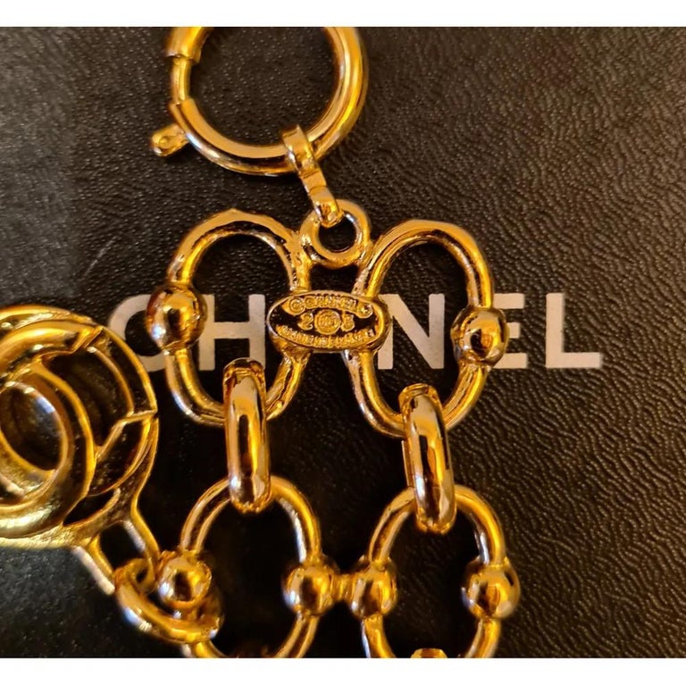 Chanel iconic gold tone cc logo charms bracelet For Sale at 1stDibs