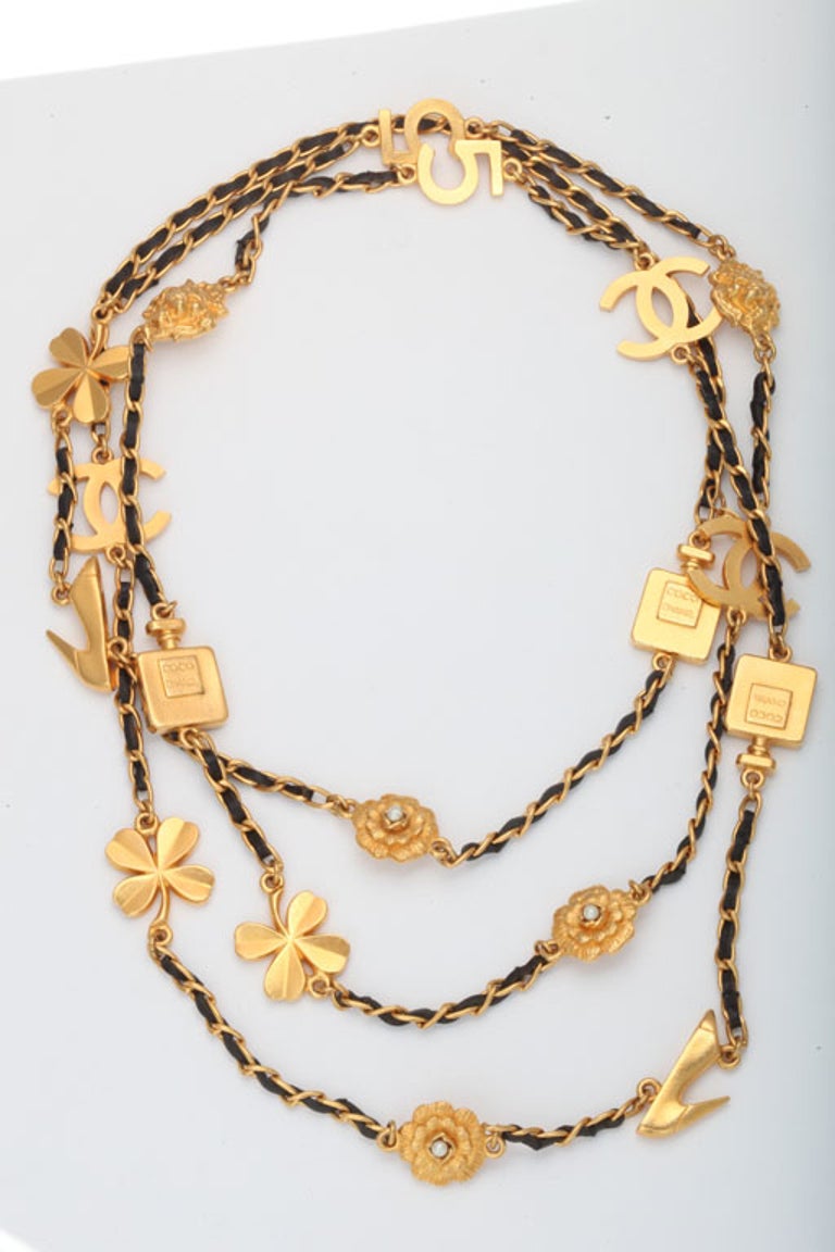 Chanel Iconic Motif Charm and Leather Long Necklace For Sale at 1stDibs