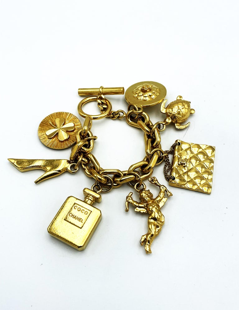 CHANEL lucky charm bracelet with 7 iconic Chanel pendants gold-plated ...