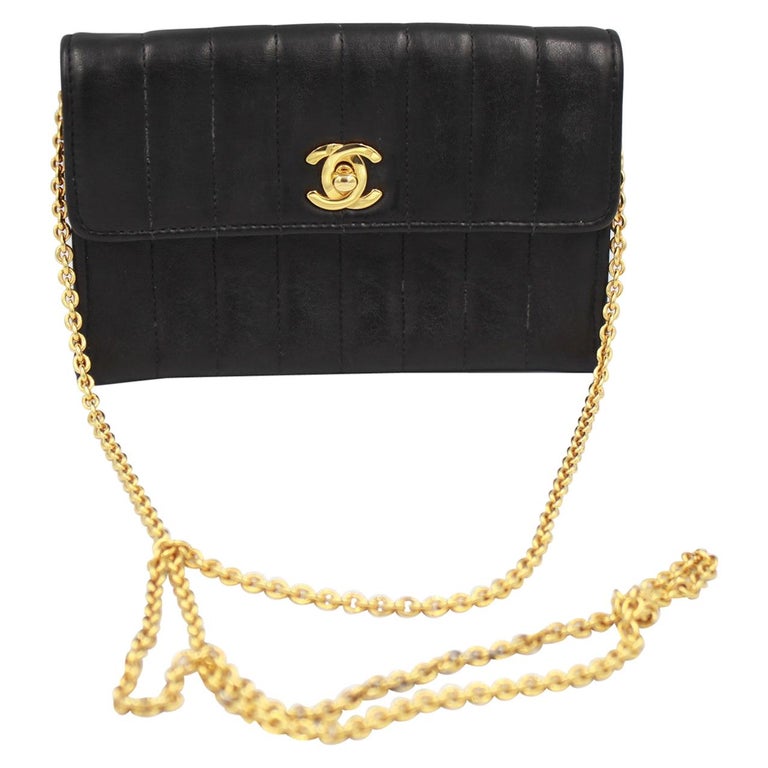 Chanel mini handbag in black leather at 1stDibs