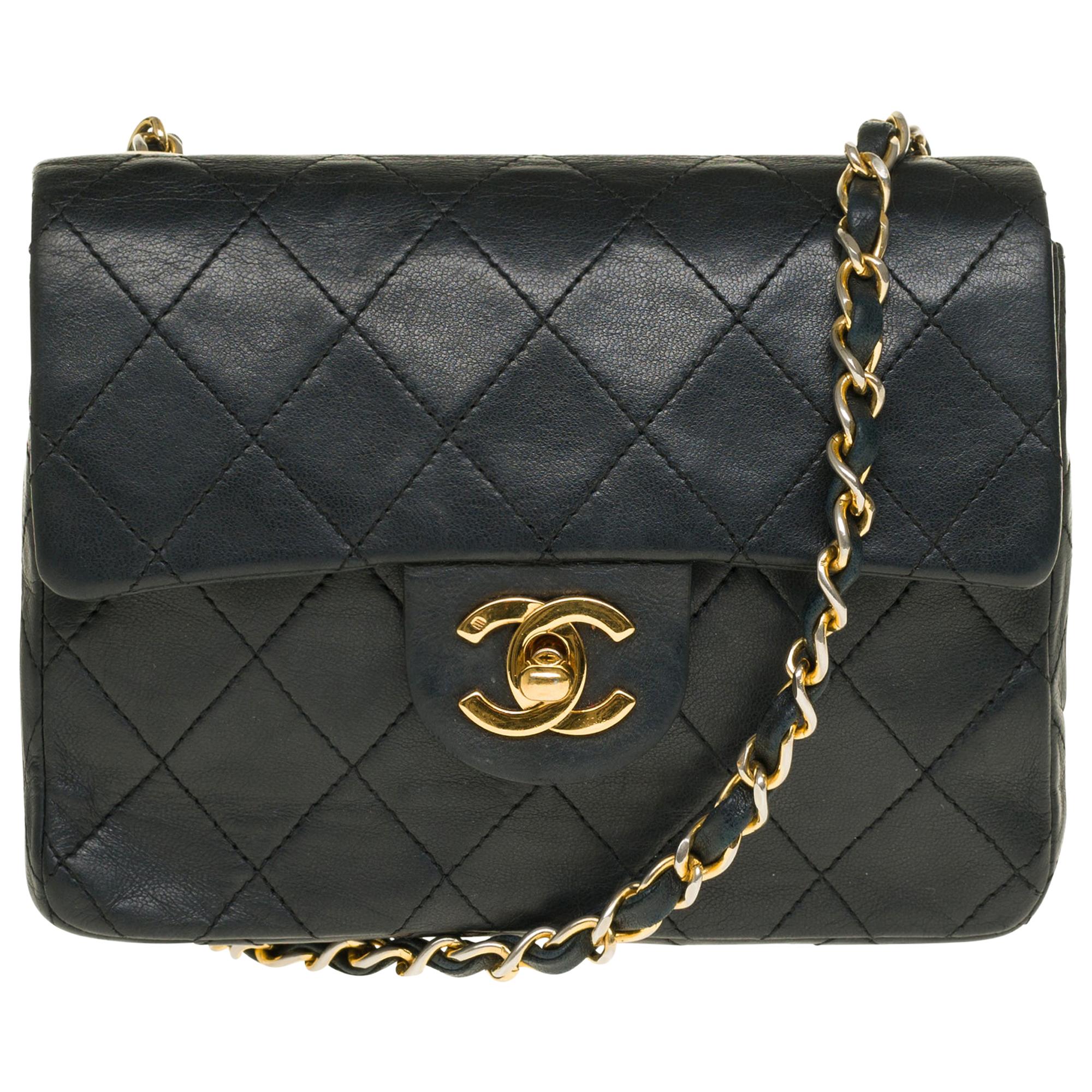 Chanel Mini Timeless handbag in black quilted lambskin, gold hardware ...