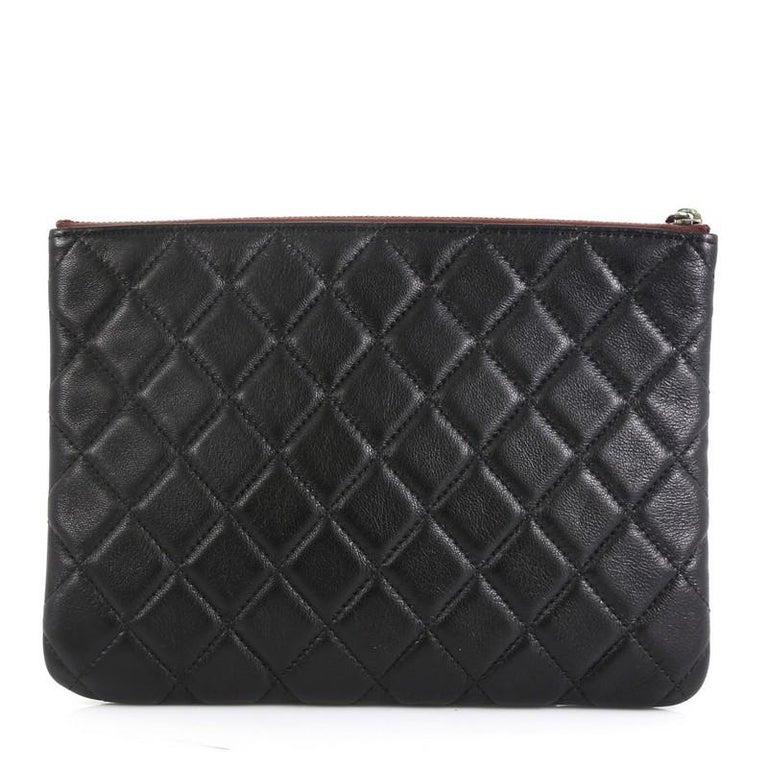 Chanel O Case Clutch Quilted Lambskin Small at 1stDibs