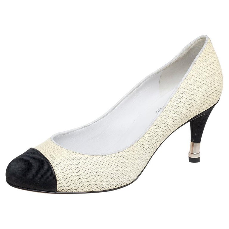 Chanel Off White/Black Leather And Canvas CC Cap Toe Pumps Size 39 at ...