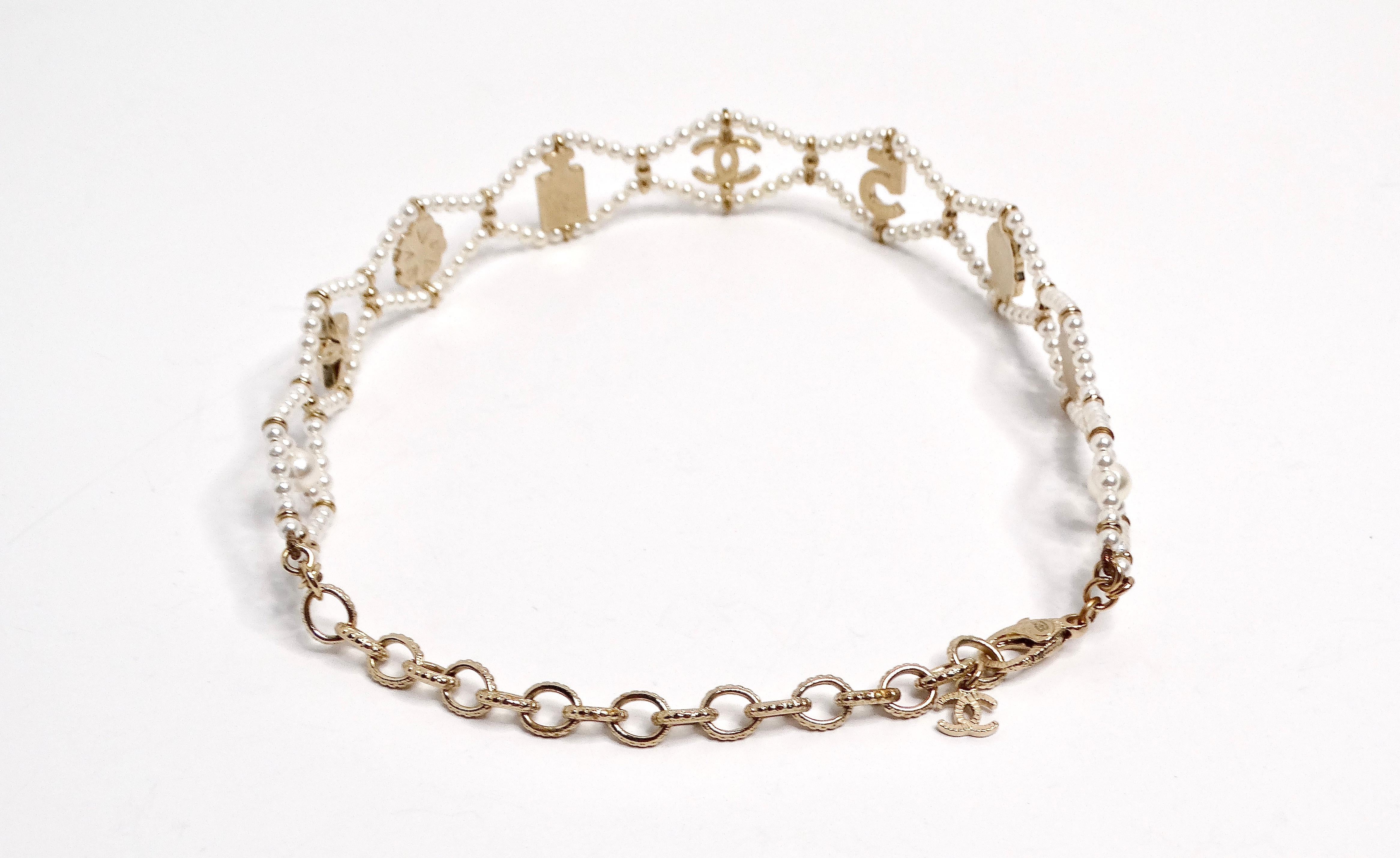 Chanel Pearl Choker Necklace With Iconic Chanel Motifs For Sale at 1stDibs