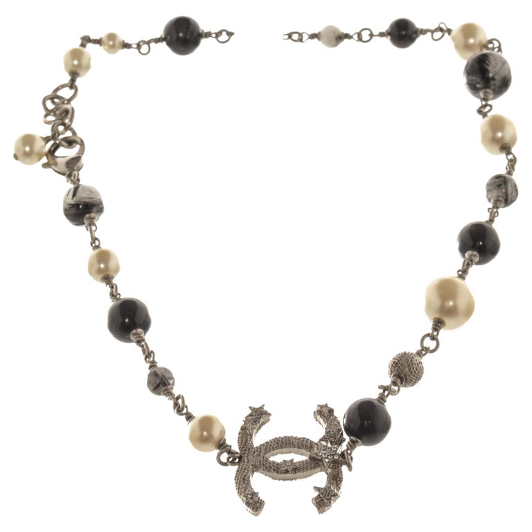 Chanel Pearl and Stone Silver CC Logo Necklace at 1stDibs