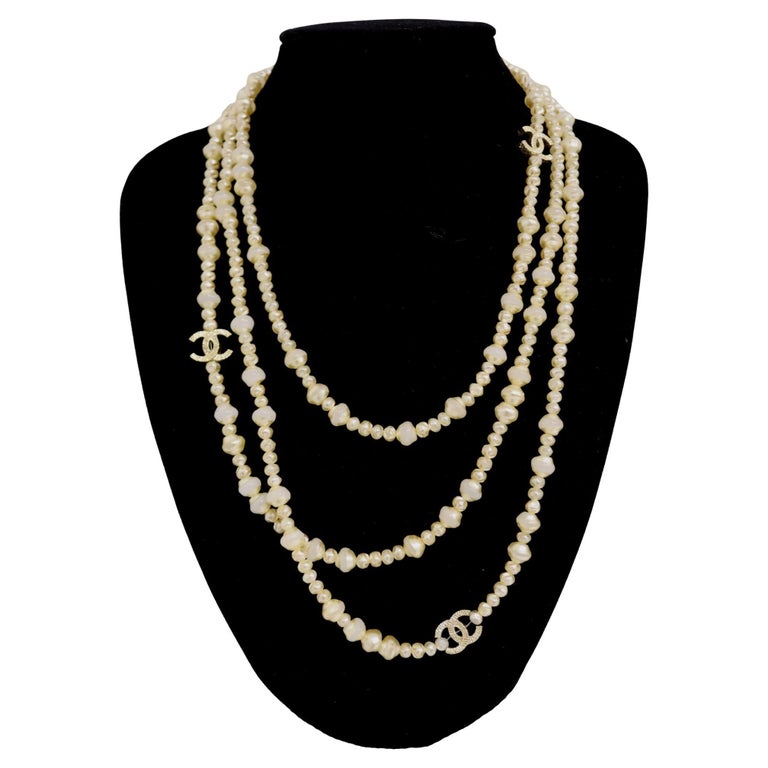 Chanel Pearl Triple Strand Necklace with CC Logo For Sale at 1stDibs