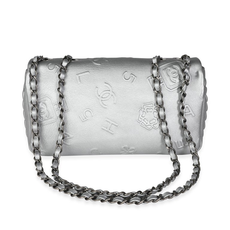 Chanel Silver Embossed Precious Symbols Single Flap Bag For Sale at 1stDibs
