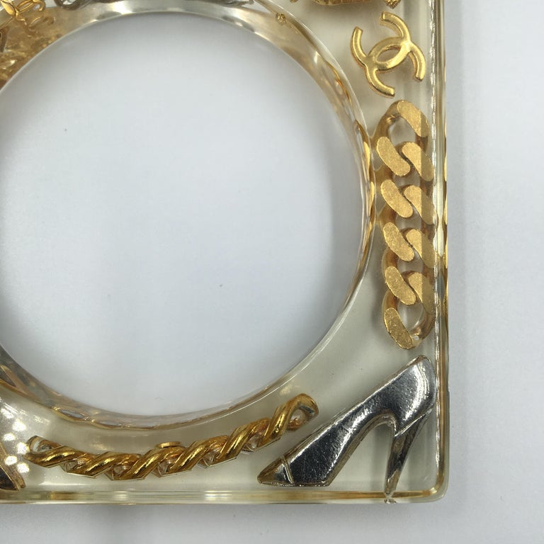 Chanel Square Lucite Bangle with Gold and Silver Inlaid Charms For Sale ...