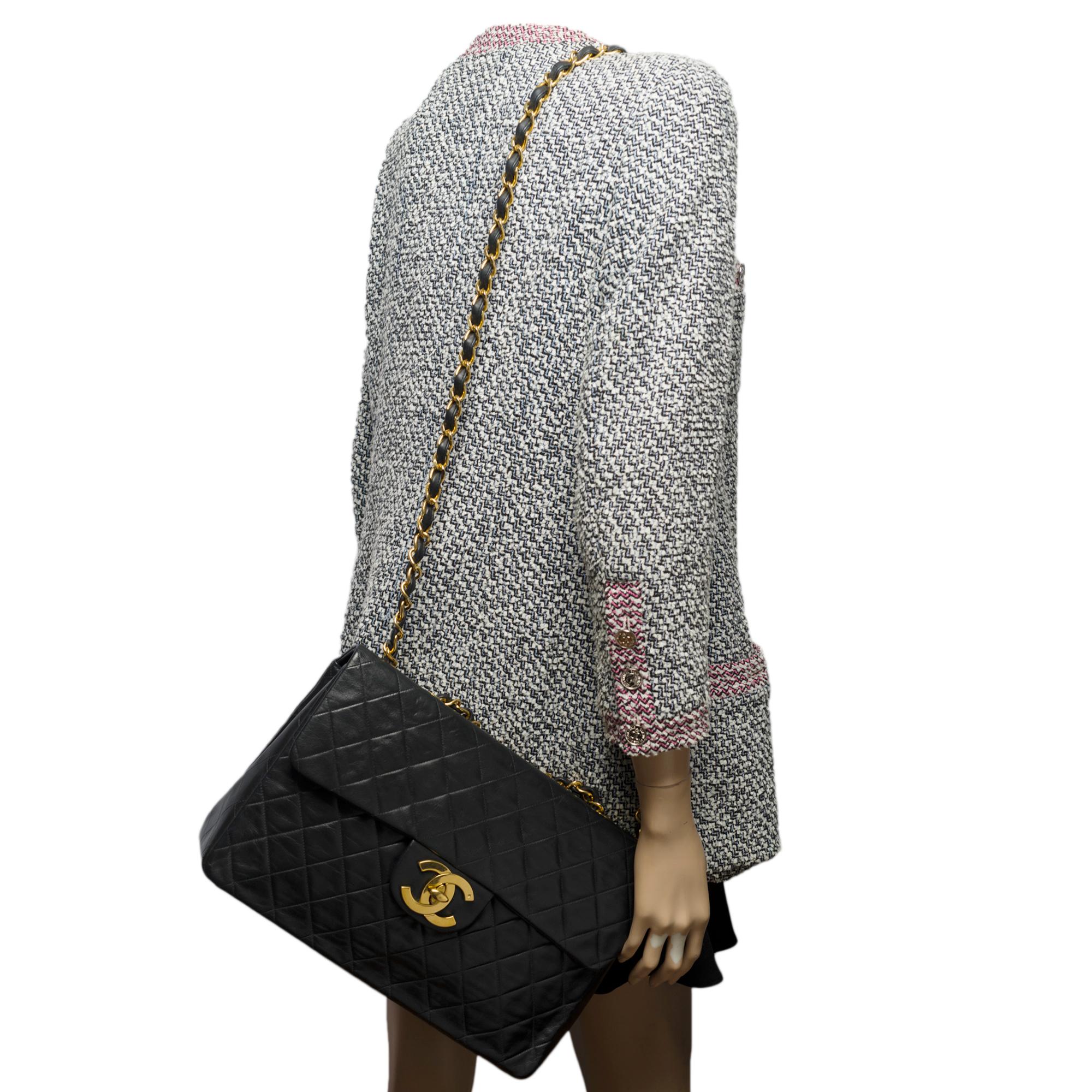 Chanel Timeless Maxi Jumbo flap shoulder bag in black quilted lambskin ...