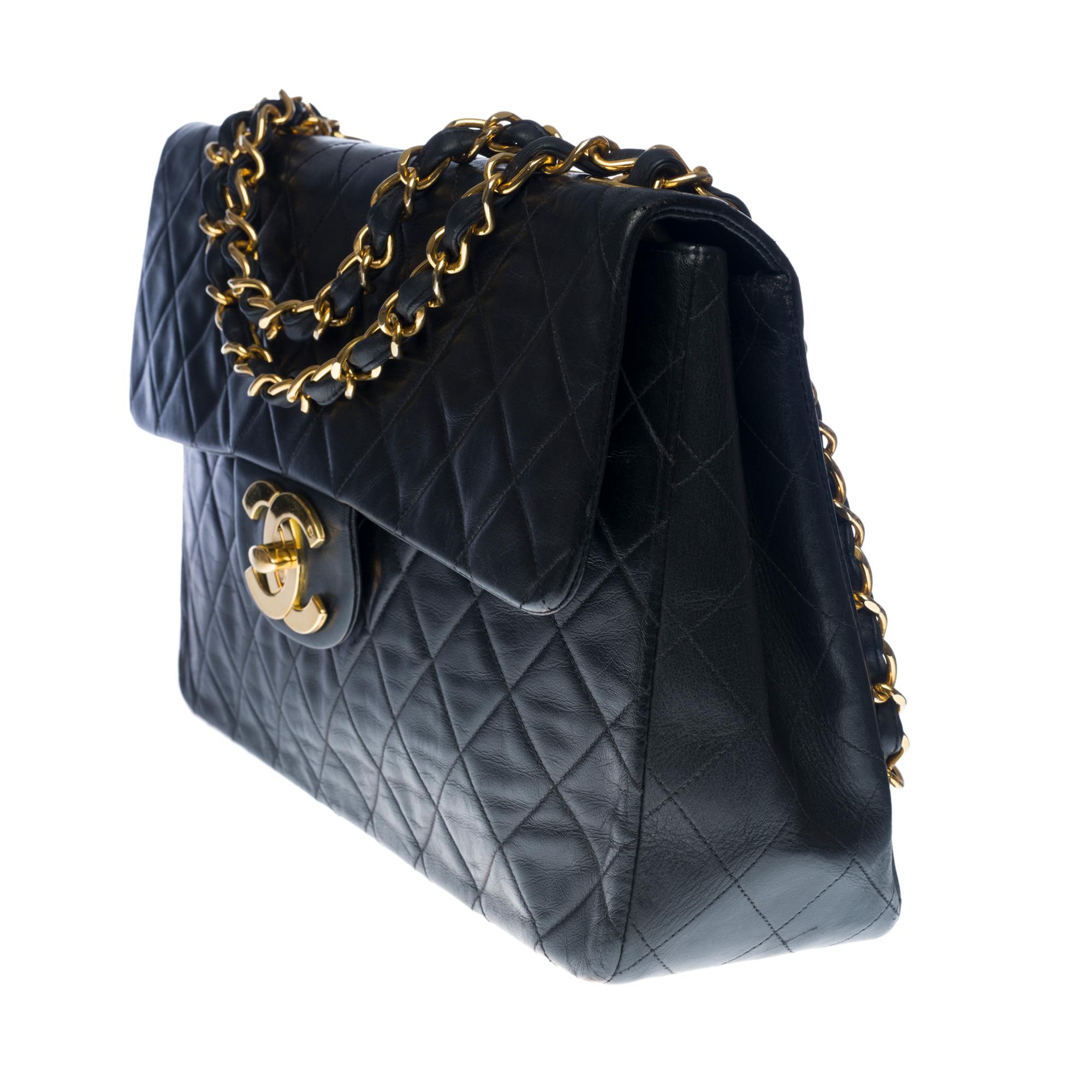 Chanel Timeless Maxi Jumbo flap shoulder bag in black quilted lambskin ...