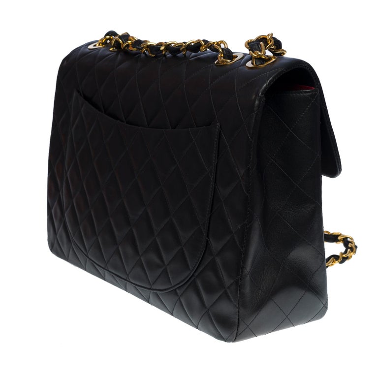 Chanel Timeless Maxi Jumbo flap shoulder bag in black quilted lambskin ...
