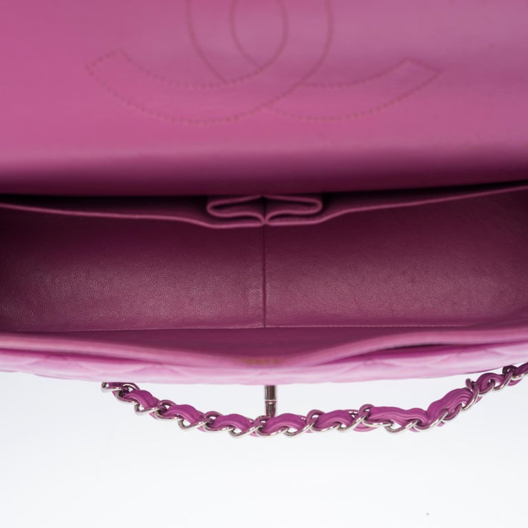 Chanel Timeless Maxi Jumbo single flap handbag in black quilted patent ...