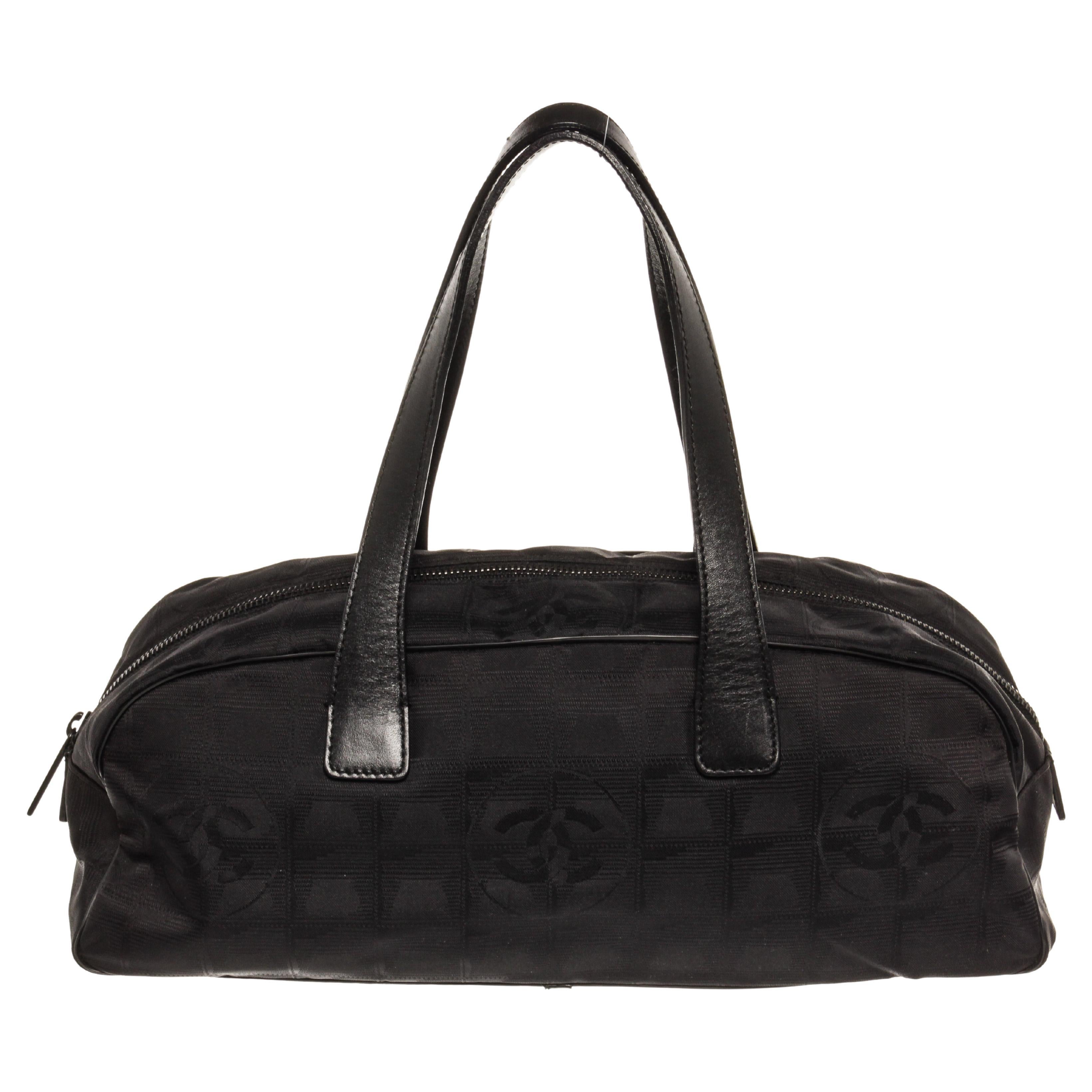 Chanel Vintage White Quilted Leather Black Logo Duffle Bag at 1stDibs ...