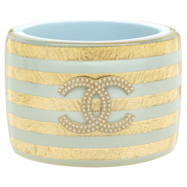 Chanel Turquoise and Gold Striped CC Cuff Bracelet at 1stDibs