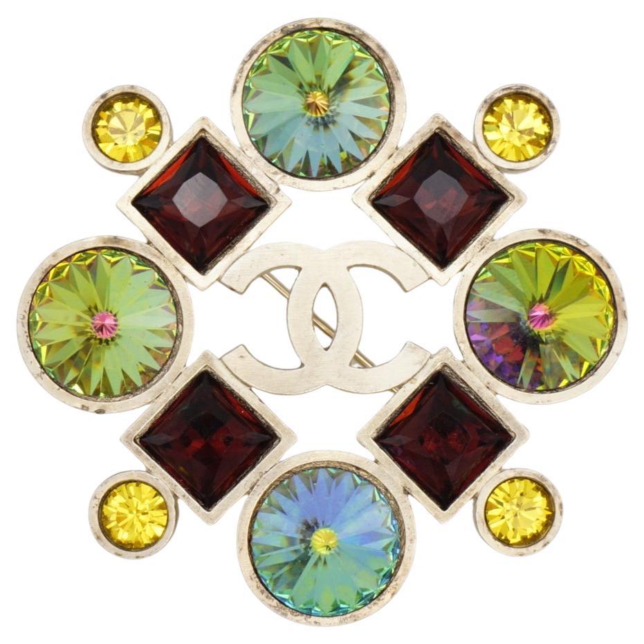 Chanel Vintage 2006 Aurora Yellow Crystals Logo Coco CC Openwork Chunky Brooch For Sale at 1stDibs