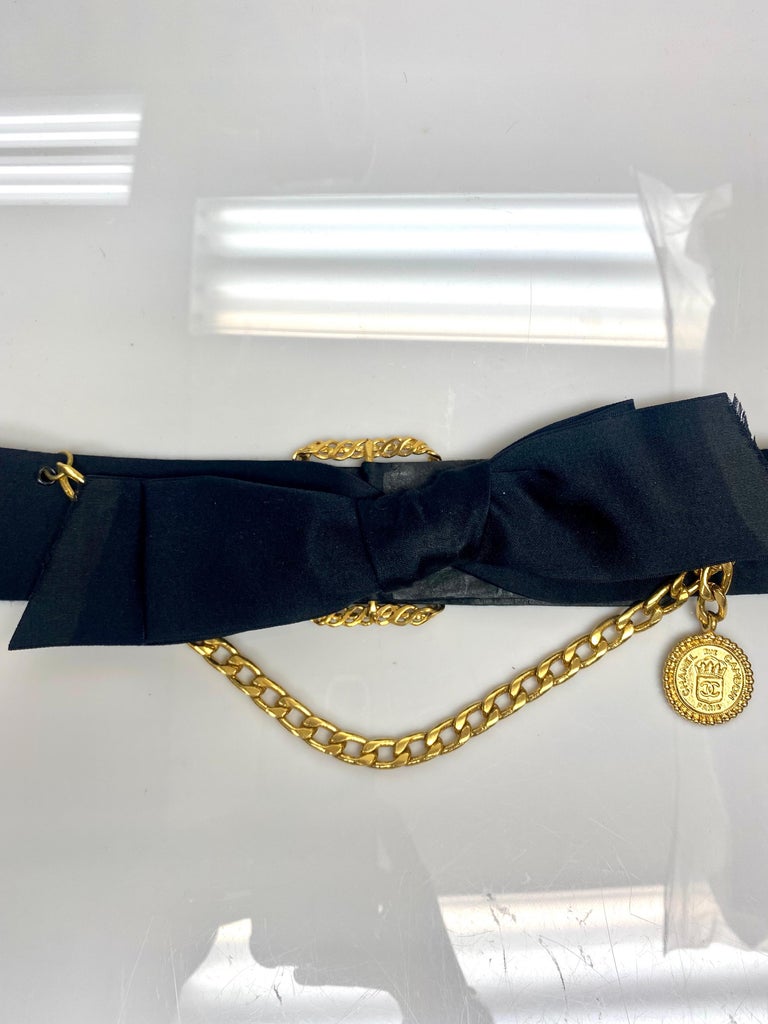Chanel Vintage Black Satin Bow with Gold Buckle, Chain and Medalion ...