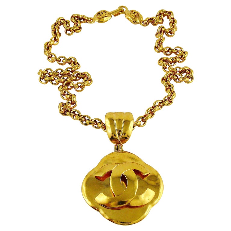 Chanel Vintage Gold Toned Logo Pendant Necklace, 1997 at 1stDibs