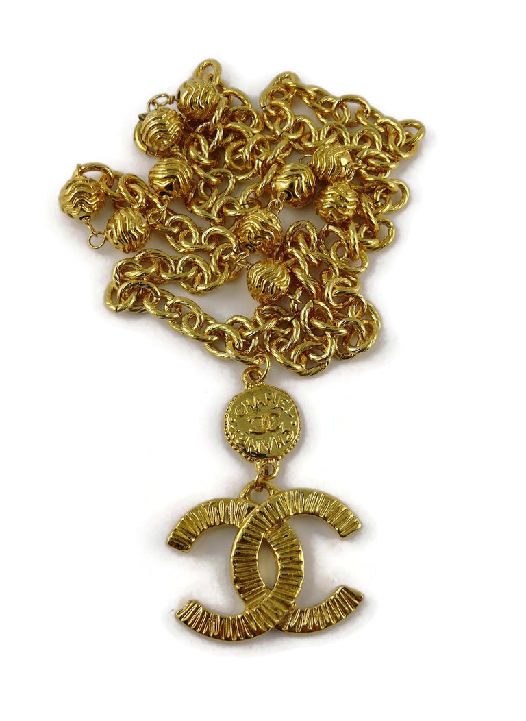 Chanel Vintage Gold Toned Logo Pendant Necklace For Sale at 1stDibs